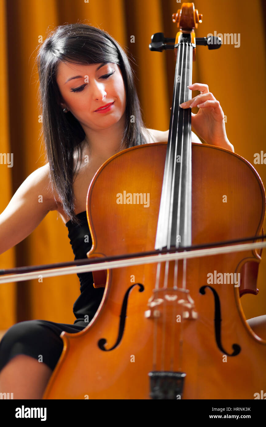 Woman playing cello hi-res stock photography and images - Alamy