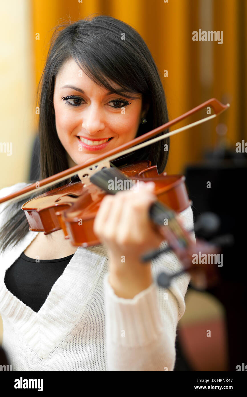 Woman playing violin at the conservatory Stock Photo - Alamy