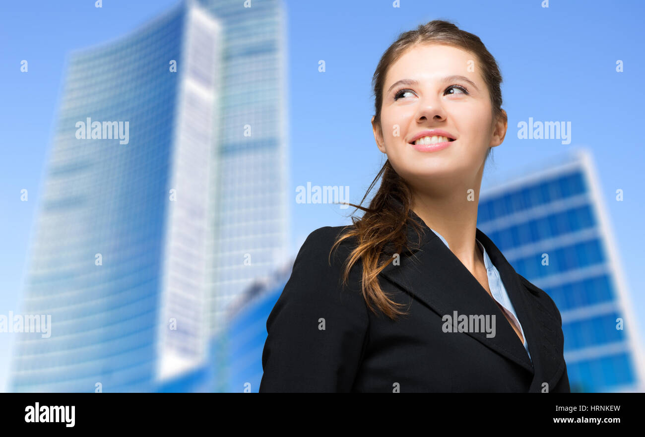 Portrait of a young smiling business woman Stock Photo - Alamy