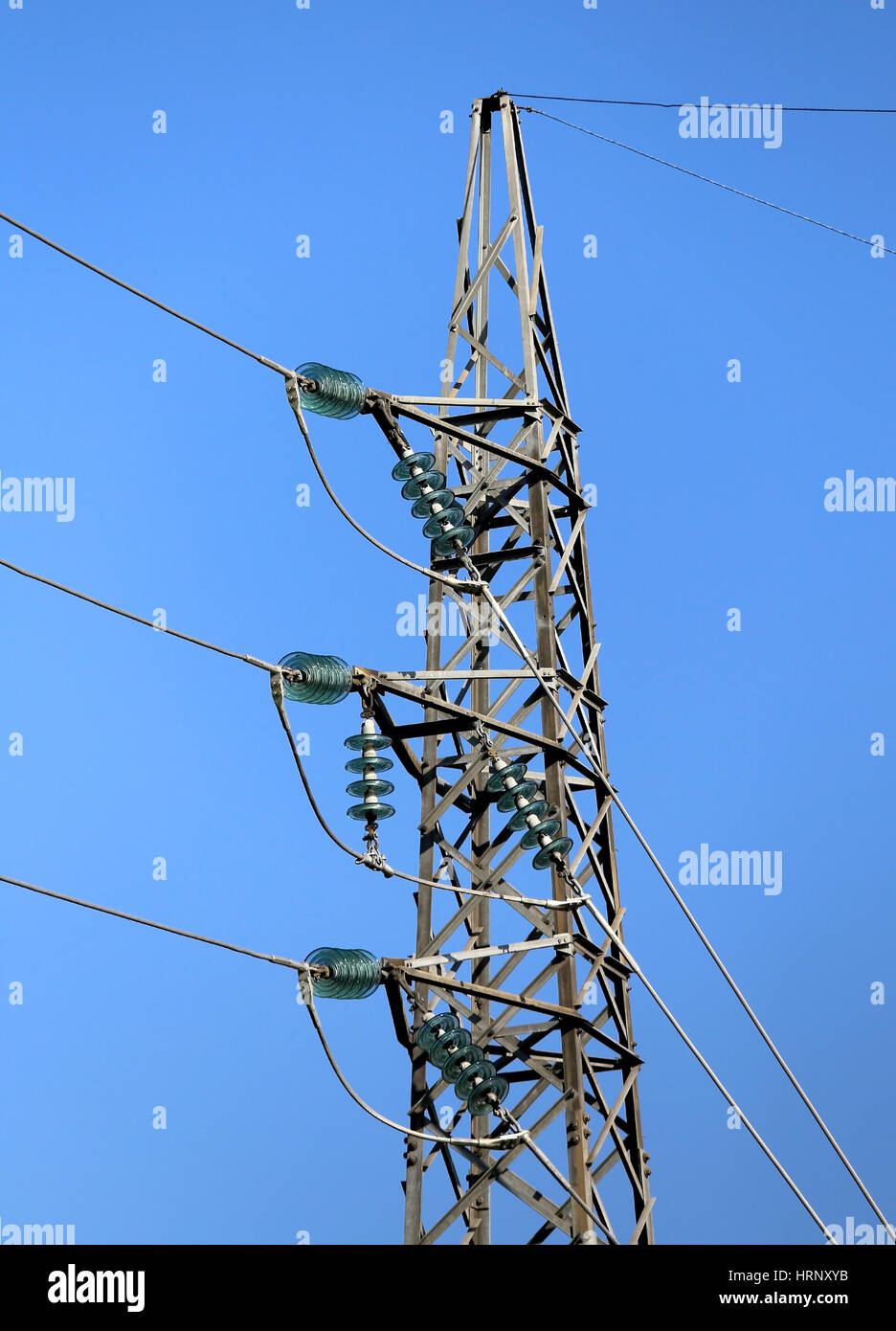 great pylon of high voltage cables with tempered glass insulators Stock ...