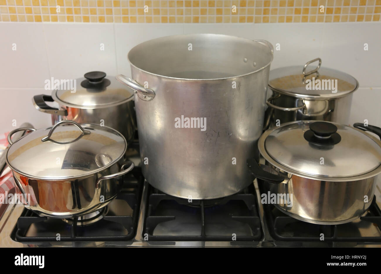 large and small pots in the Commercial kitchen Stock Photo - Alamy