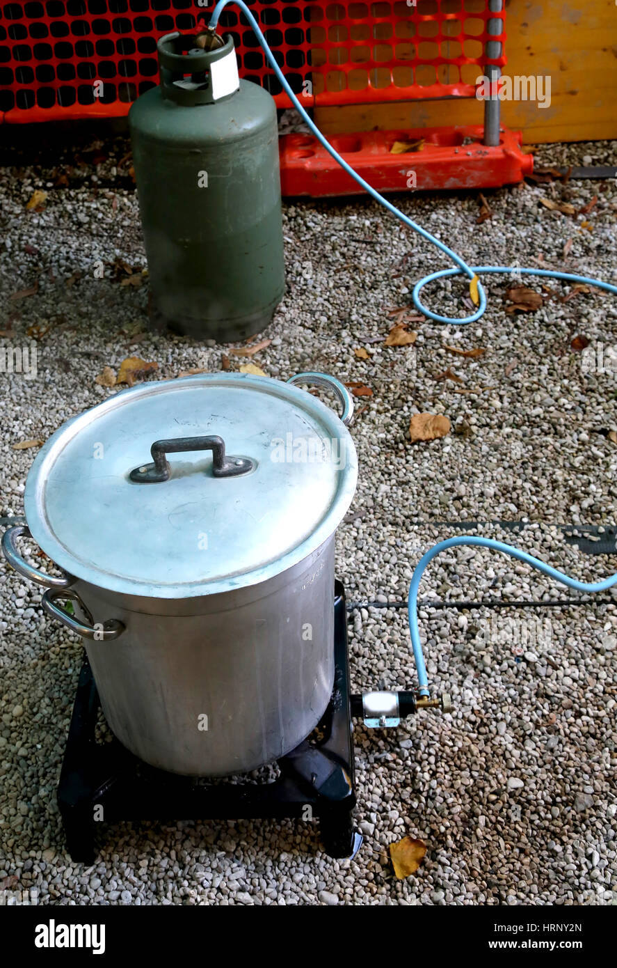 gas bottle and pot in the kitchen for food preparation Stock Photo - Alamy