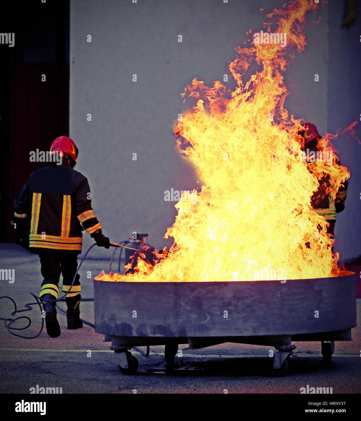 firefighters during the exercise for the fire extinguishing Stock Photo ...