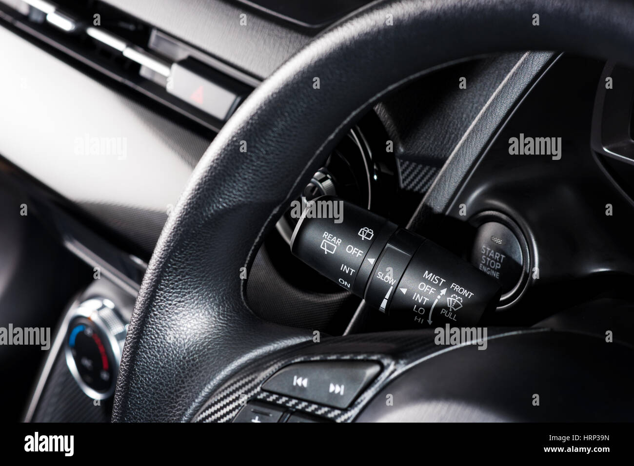 closeup details of windshield wiper switch, interior of modern car ...