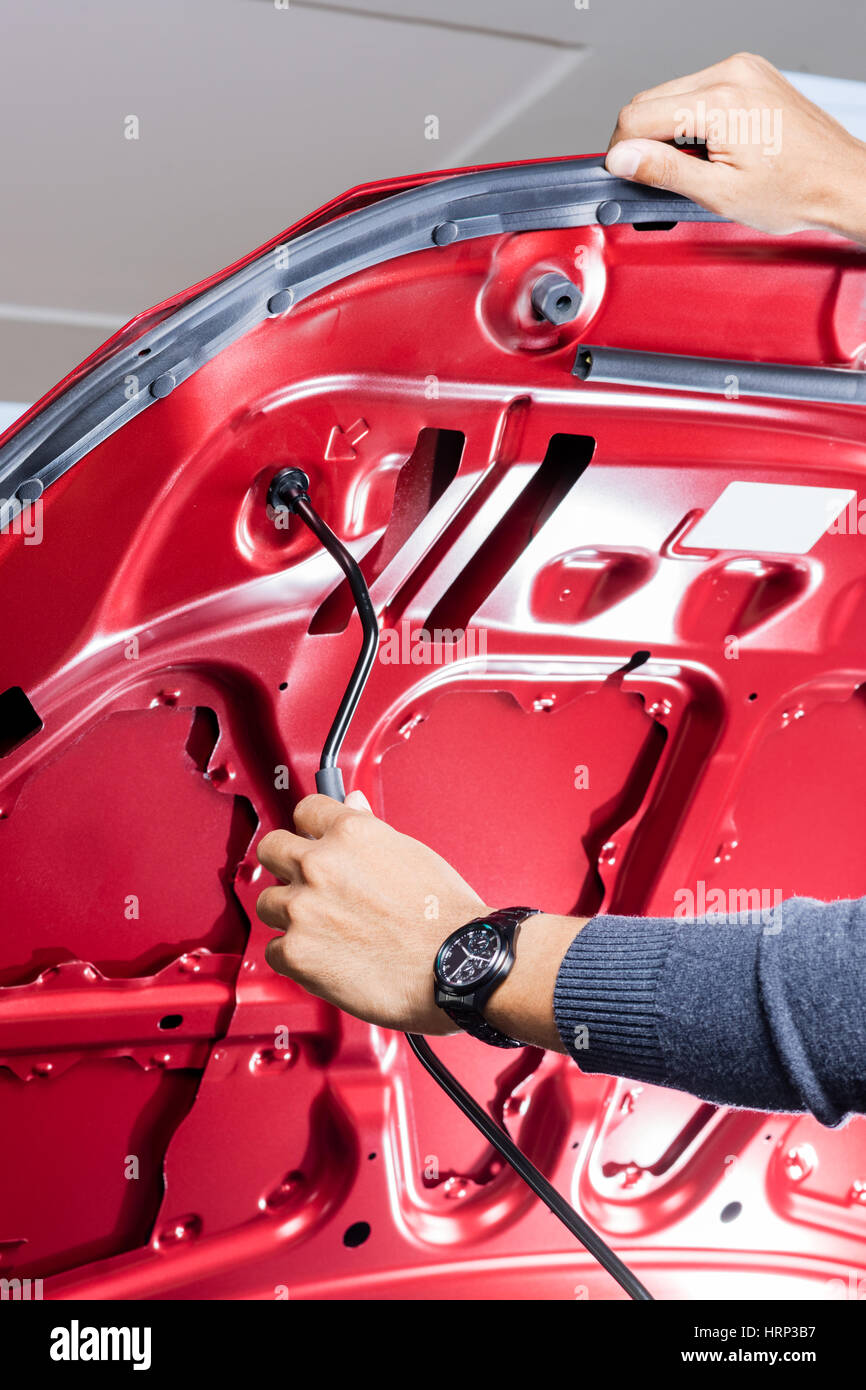 Opening car hood hi-res stock photography and images - Alamy