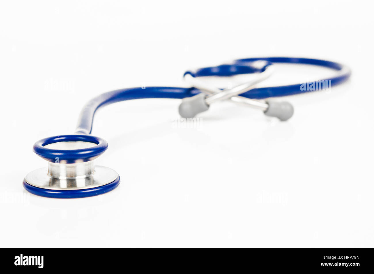 Blue stethoscope isolated on white background Stock Photo - Alamy