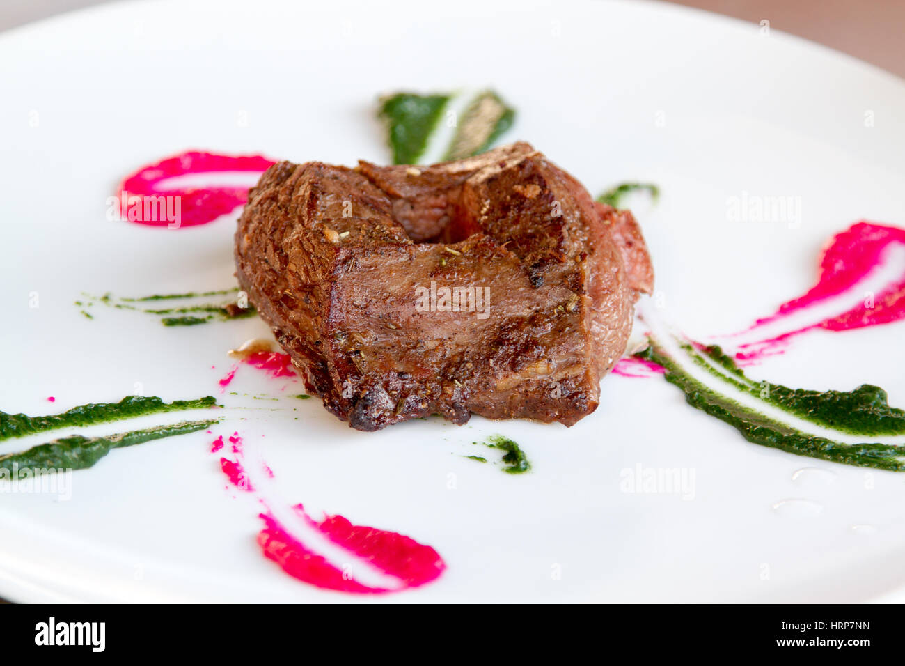 grilled red beef meat roll with sauce Stock Photo - Alamy