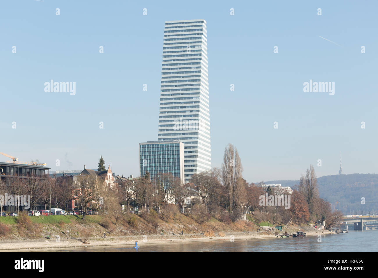 A photograph of the new Roche Tower (Building 1, or Bau 1) on the banks ...