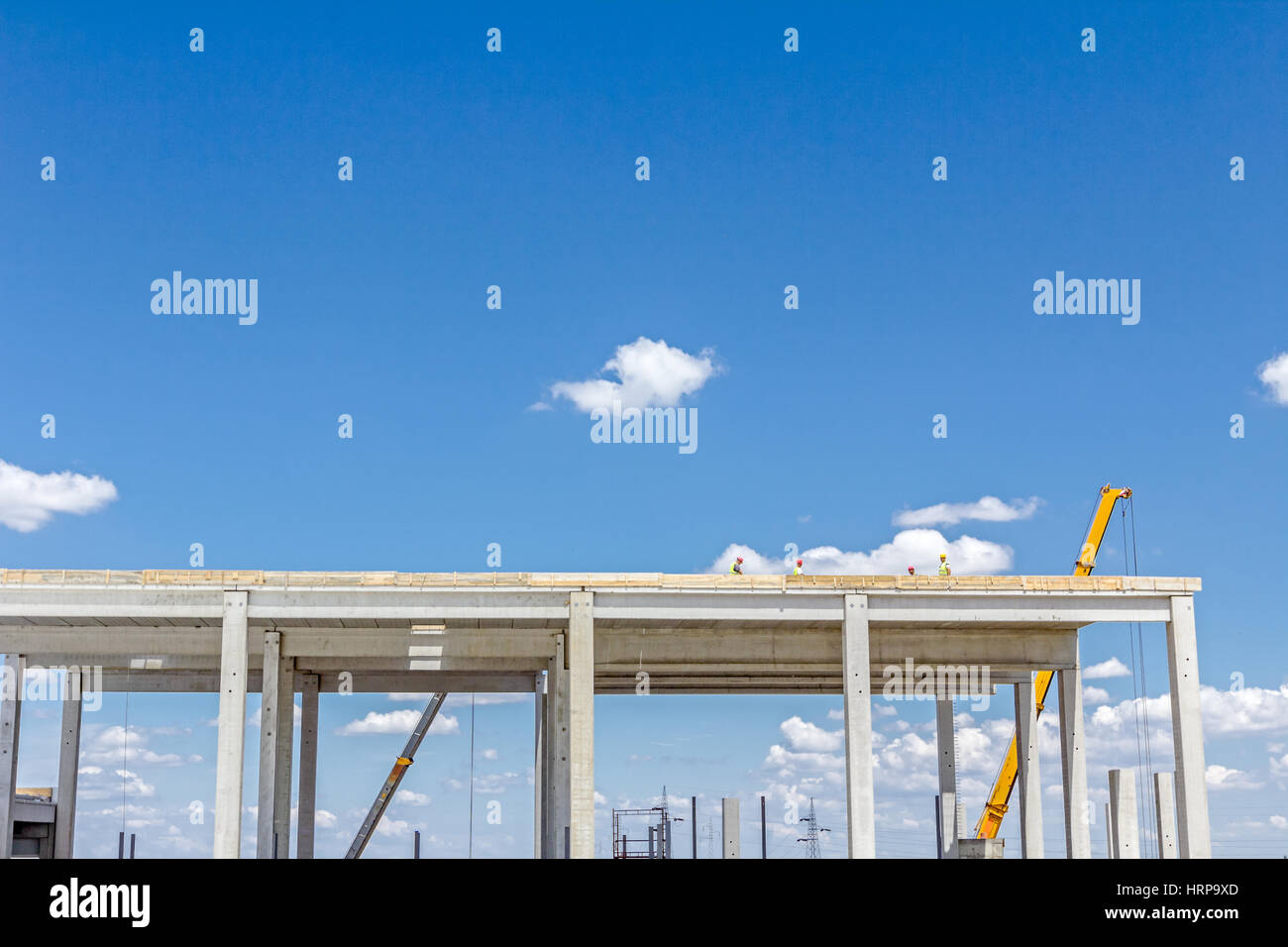 View on construction site, unfinished concrete tall edifice with ...