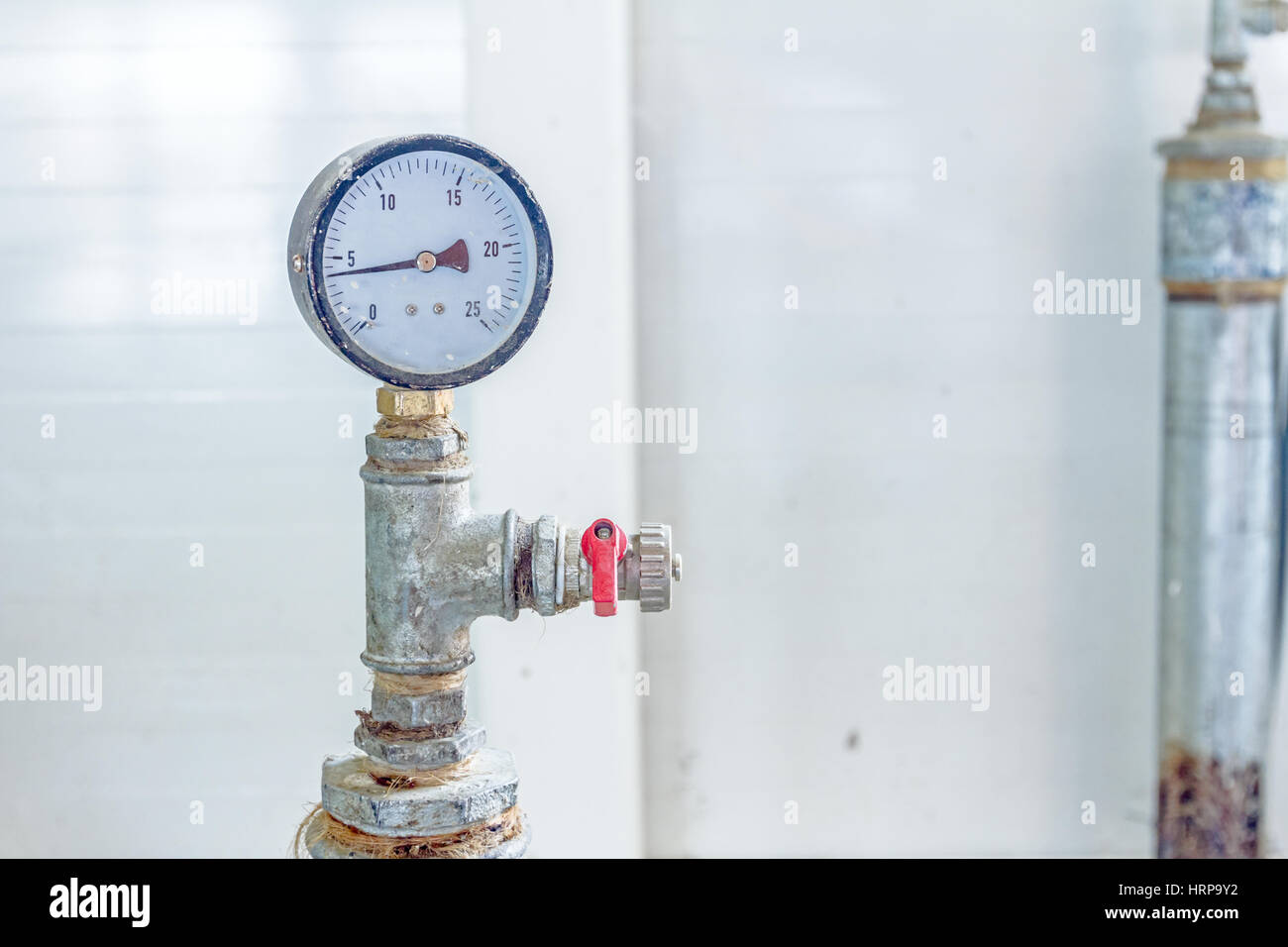 Instrument for measuring pressure attached on pipe at end of system ...