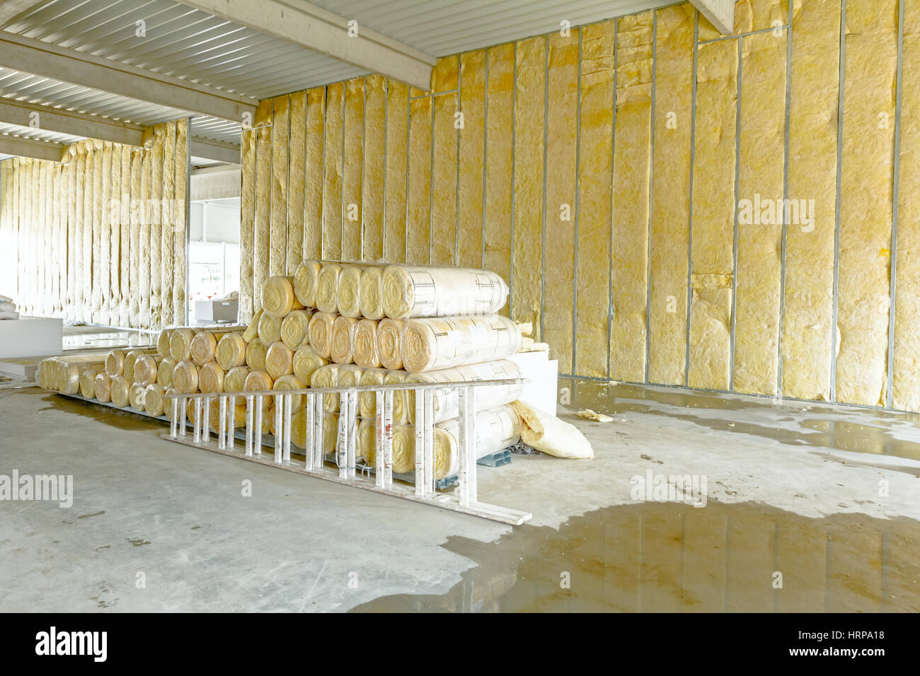 Stack of thermal insulation material in roll is wrapped with cellophane ...