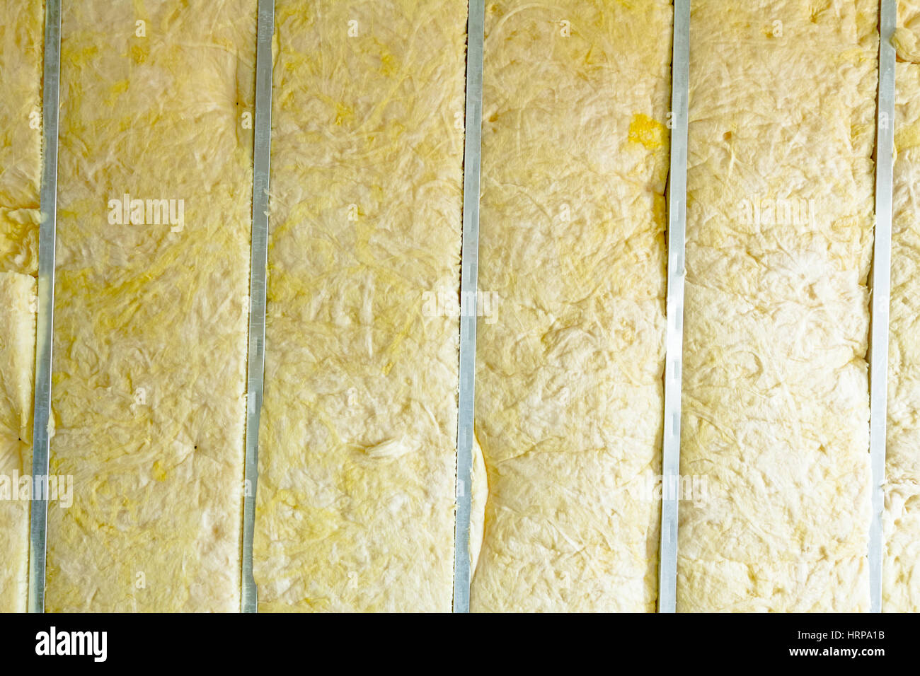 Galvanized steel joist is holding thermal insulation material, rock ...