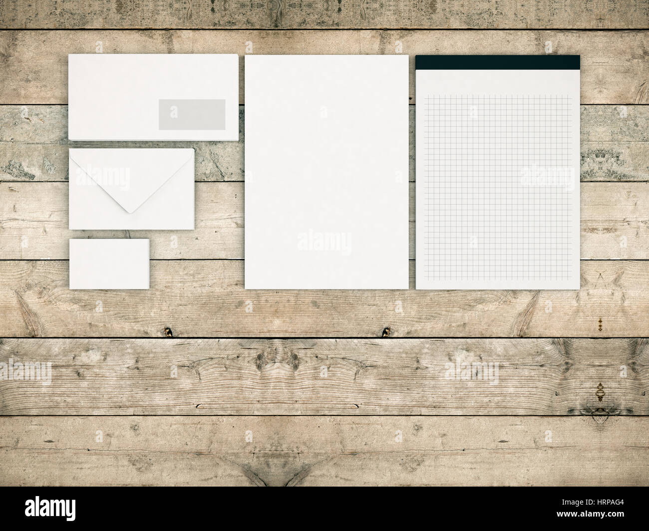 top view of a business paper set with blank space and wood background ...