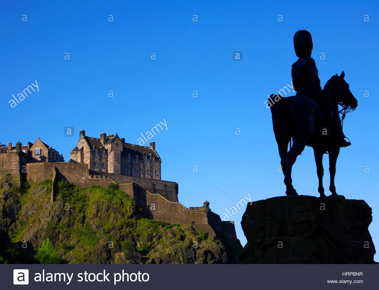 Statue of a horseman and a view of Edinburgh Castle, Princes Street ...