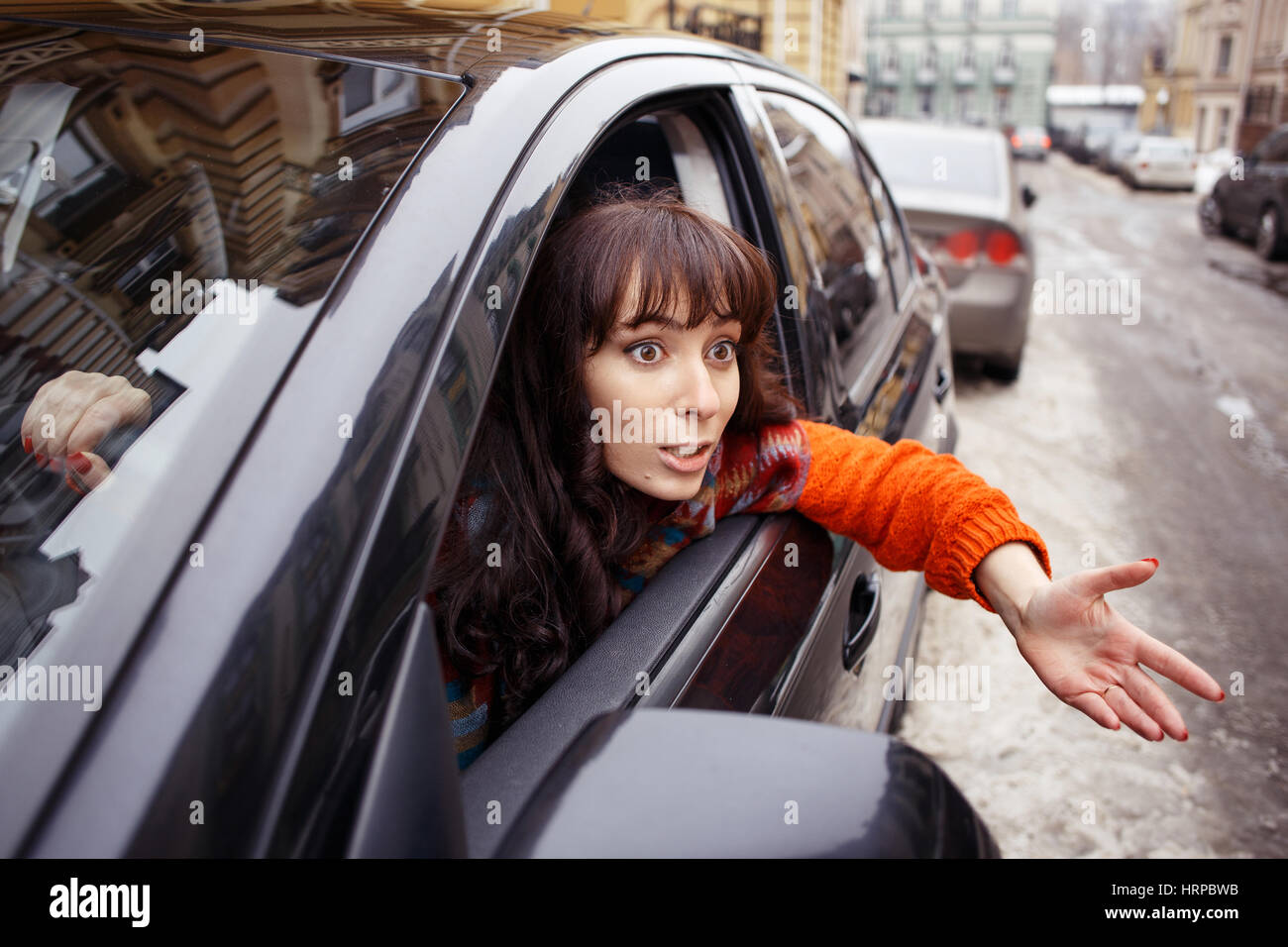 Attractive woman with resentful look Stock Photo - Alamy