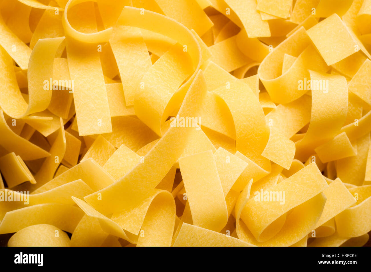 tagliatelle pasta uncooked Stock Photo - Alamy