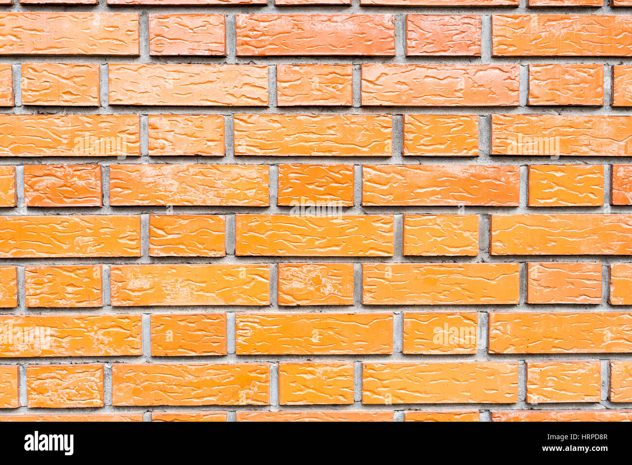 red shiny brick wall background Stock Photo - Alamy