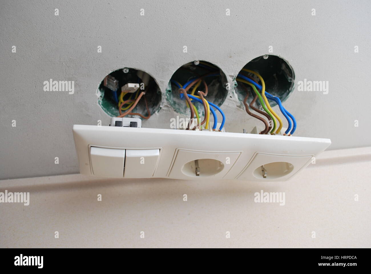 Sockets and flush switches. Connect the wires during home renovation ...