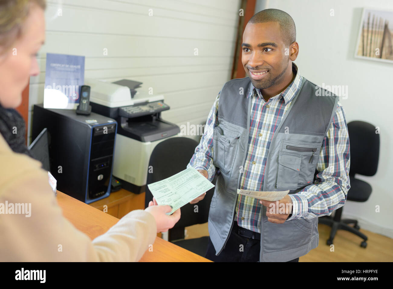 worker client transaction Stock Photo - Alamy
