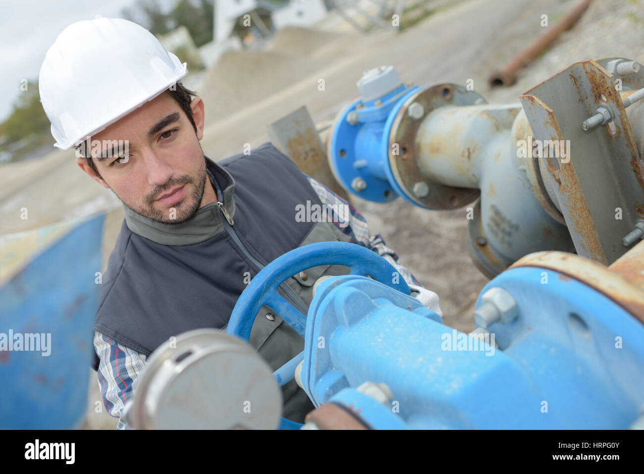 Construction worker working outdoors Stock Photo - Alamy