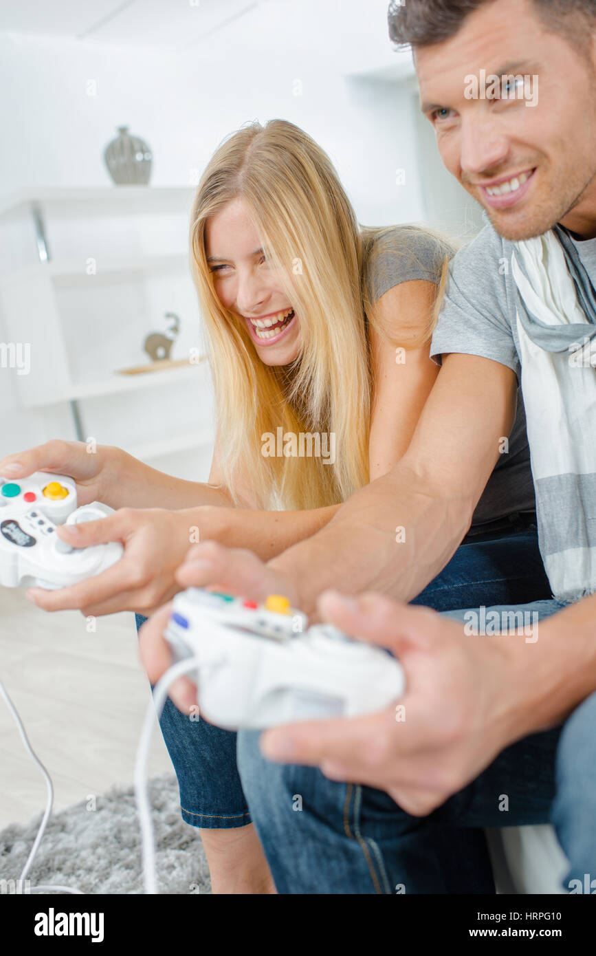 Two friends playing video games Stock Photo - Alamy