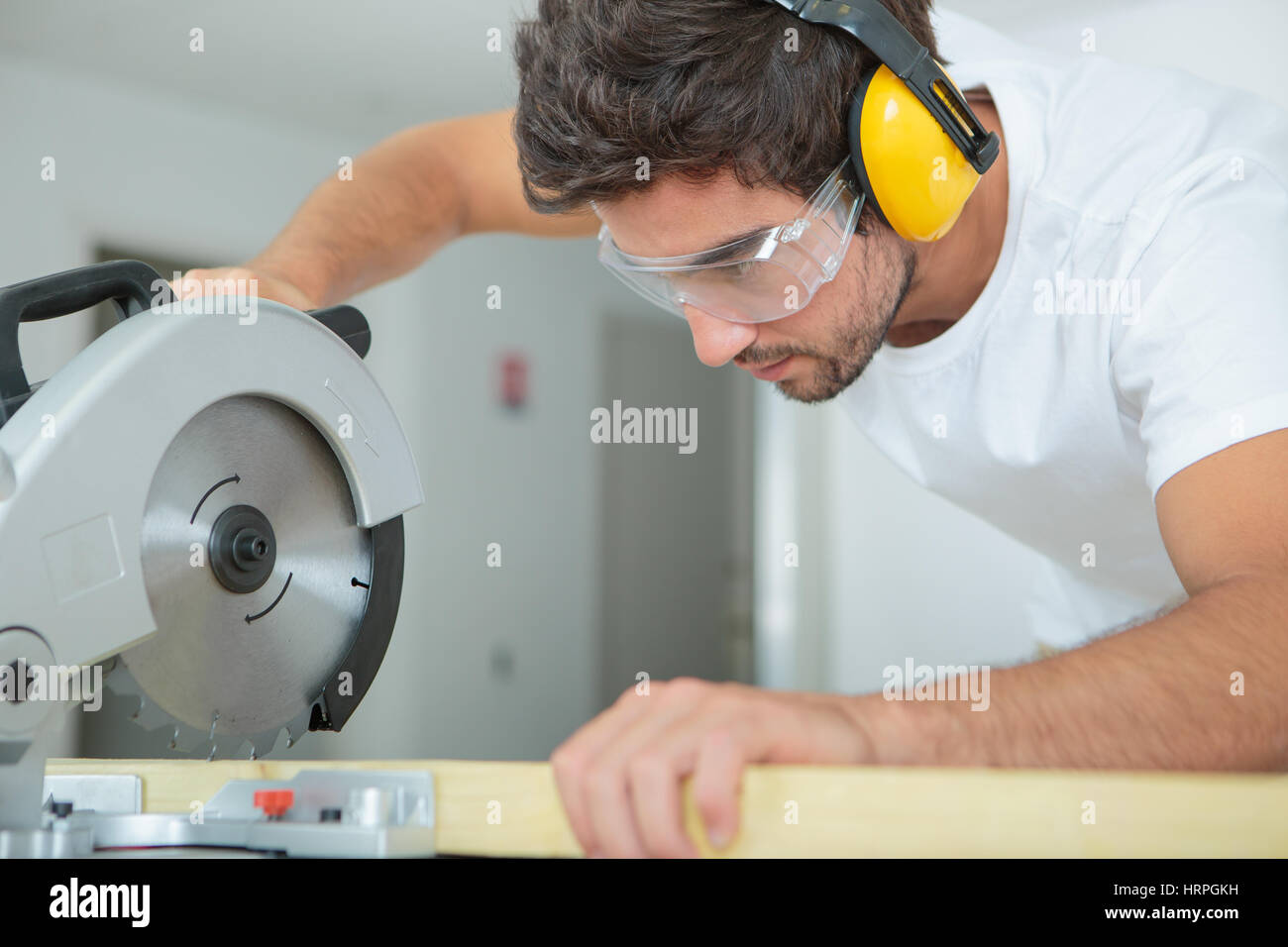 cutting a wood Stock Photo - Alamy