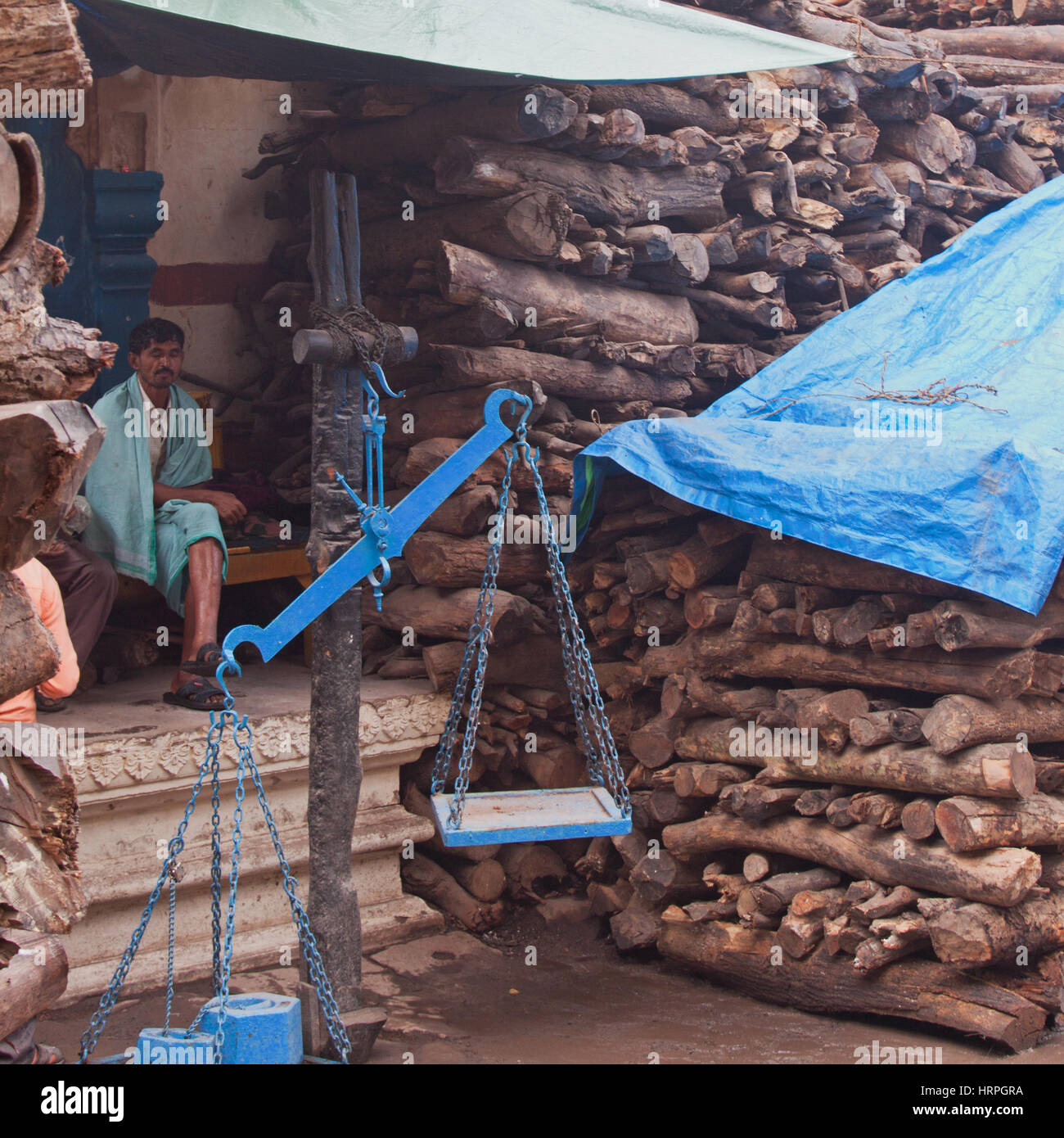 An unidentified wood merchant providing fuel for Manikarnika ghat, the ...
