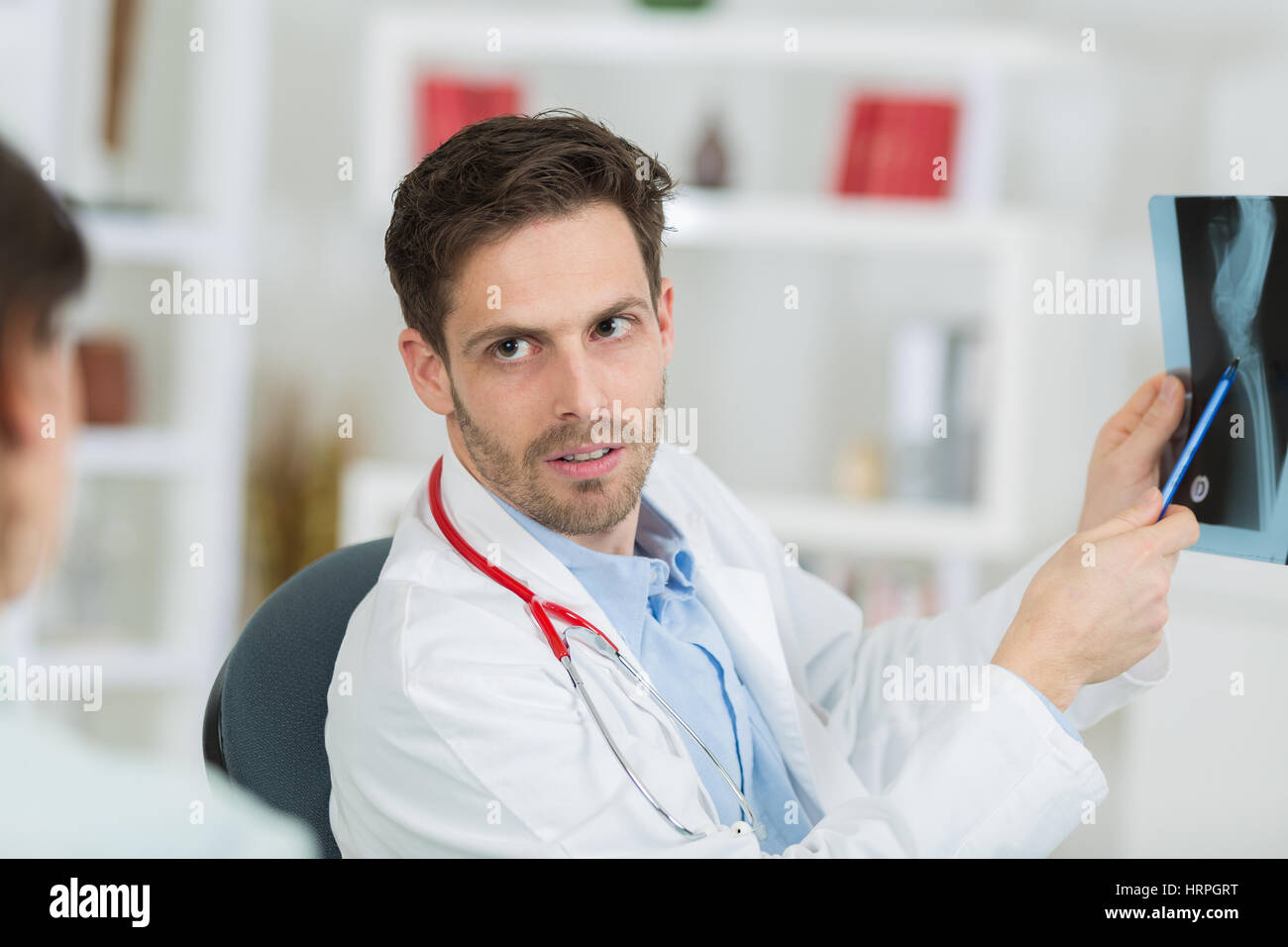medical doctor stand with a x-ray image Stock Photo - Alamy