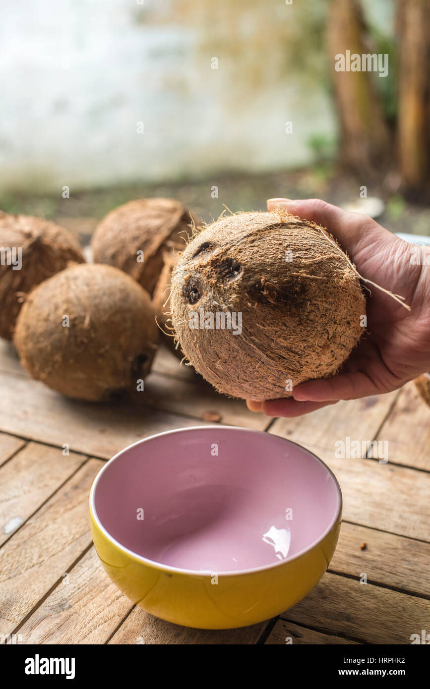 coconut water dripping Stock Photo - Alamy
