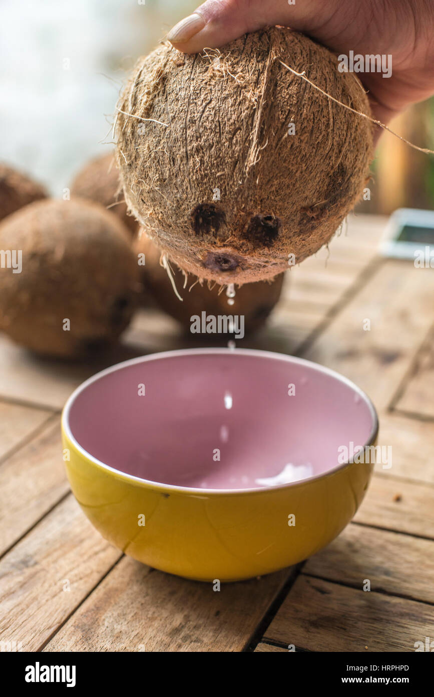 coconut water dripping Stock Photo - Alamy
