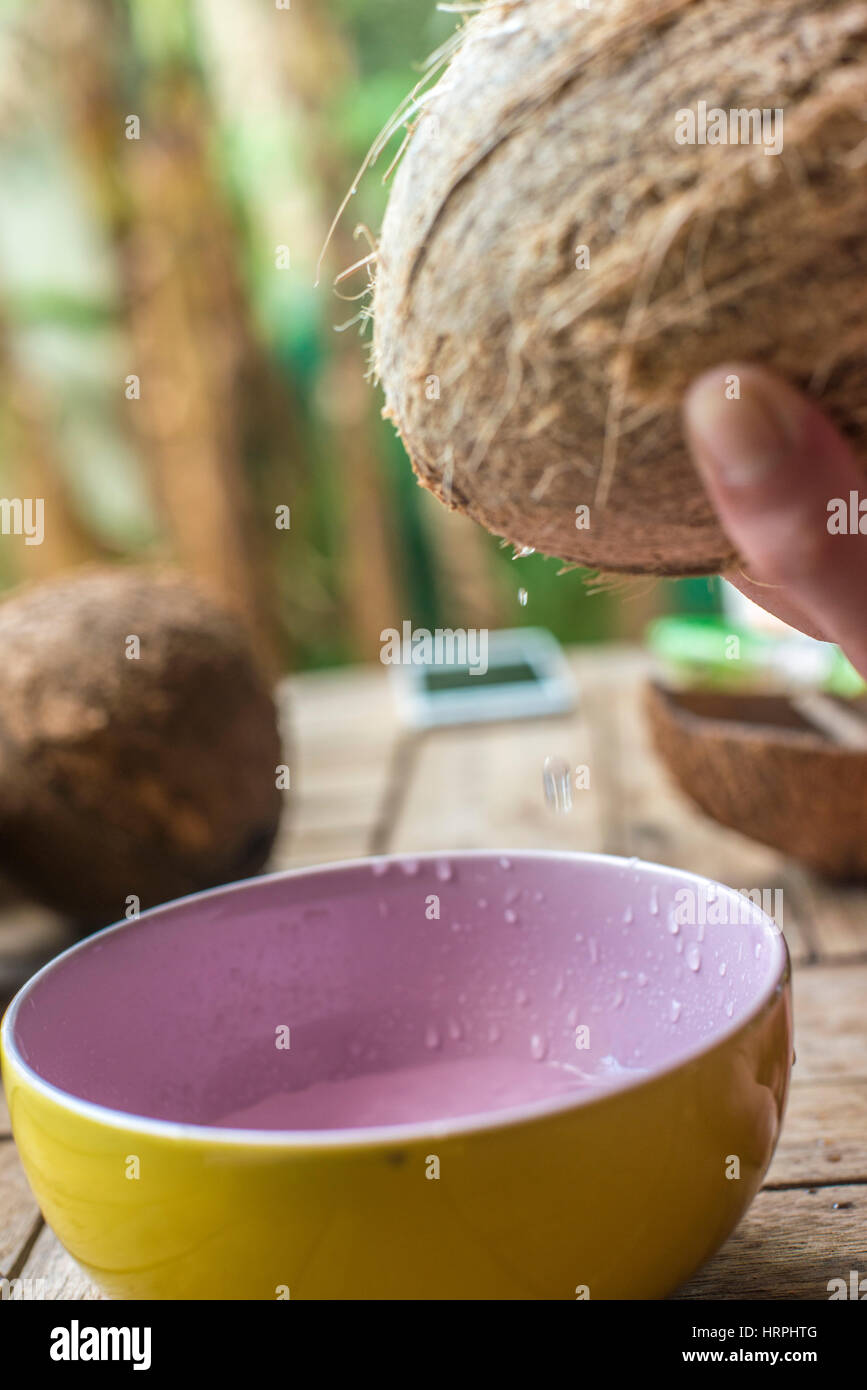 coconut water dripping Stock Photo - Alamy