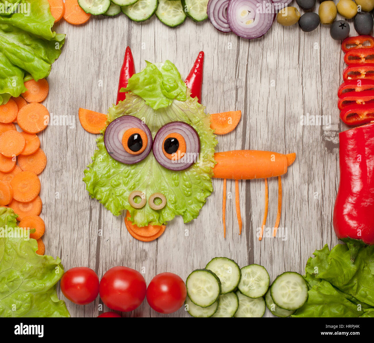 Goat made of vegetable ingredients on table Stock Photo - Alamy
