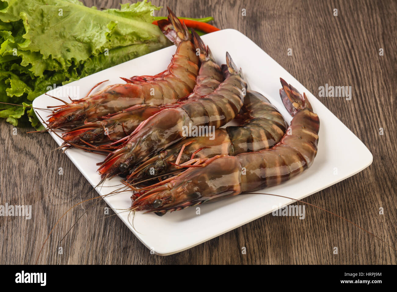 Raw big tiger prawn - ready for cooking Stock Photo - Alamy