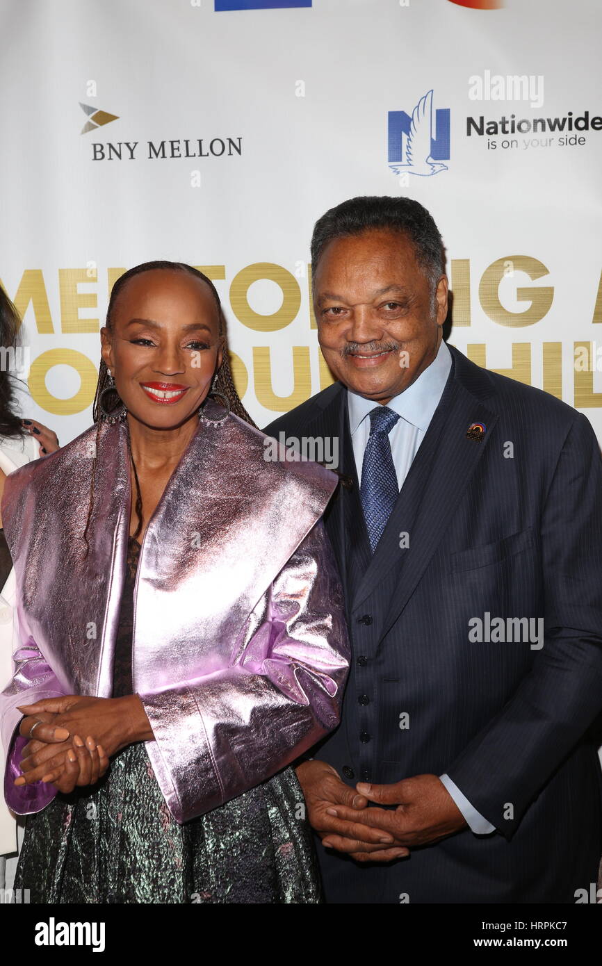 Susan L. Taylor and Reverend Jesse Jackson attending the National CARES ...