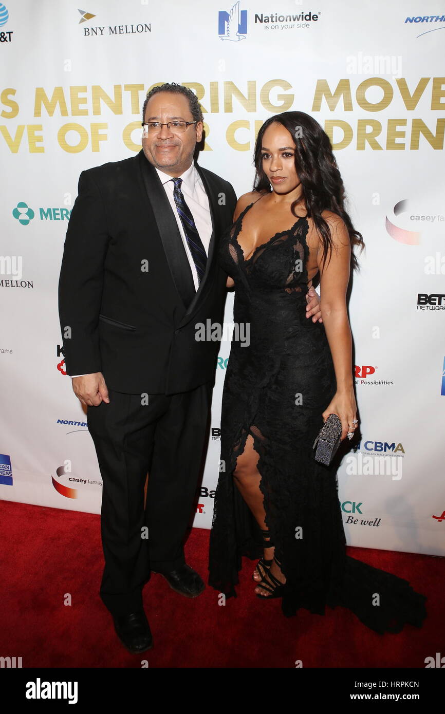Michael Eric Dyson and Melyssa Ford attending the National CARES ...