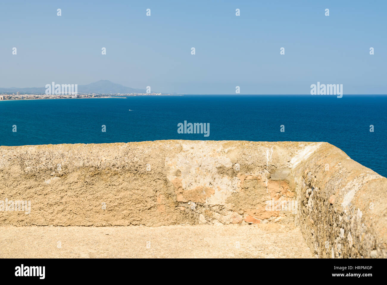 Old Castle Stone Wall With Ocean Background Stock Photo - Alamy