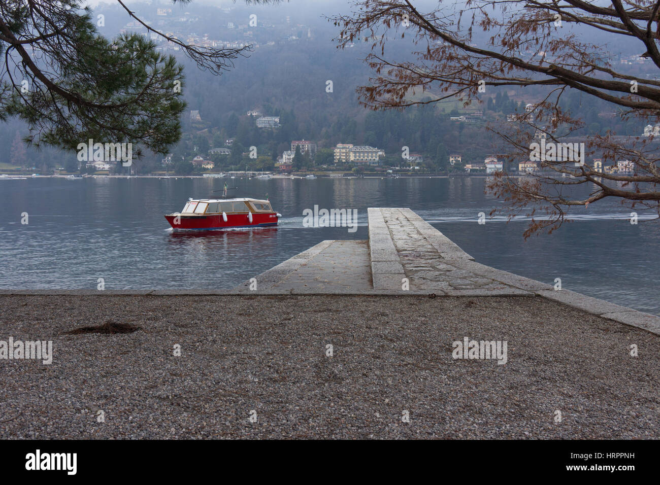 Water taxi boat arriving at Isola Bella on Lago Maggiore, Northern ...
