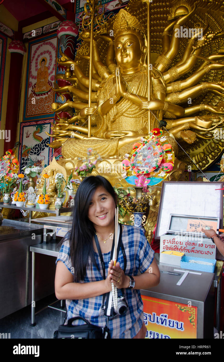 Guanyin bodhisattva and Thousand Hands statue in Chinese shrine for ...