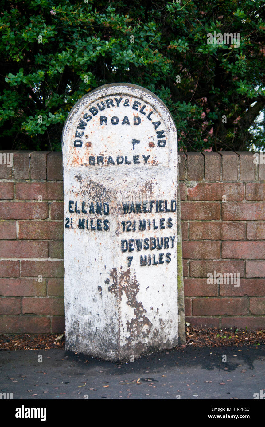 A old milestone in Huddersfield, West Yorkshire, England Stock Photo ...