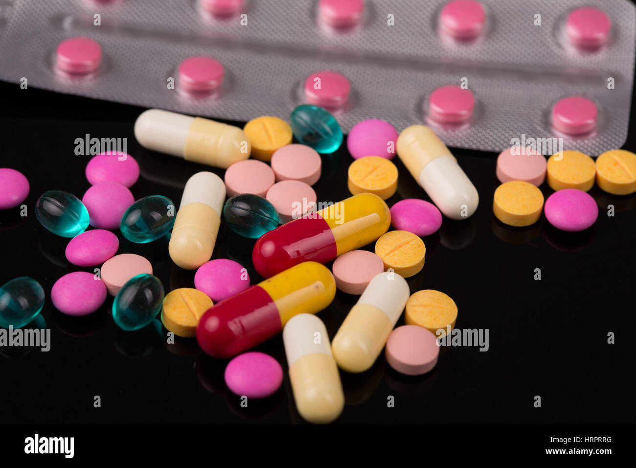 different tablets pills capsule heap mix therapy drugs Stock Photo - Alamy