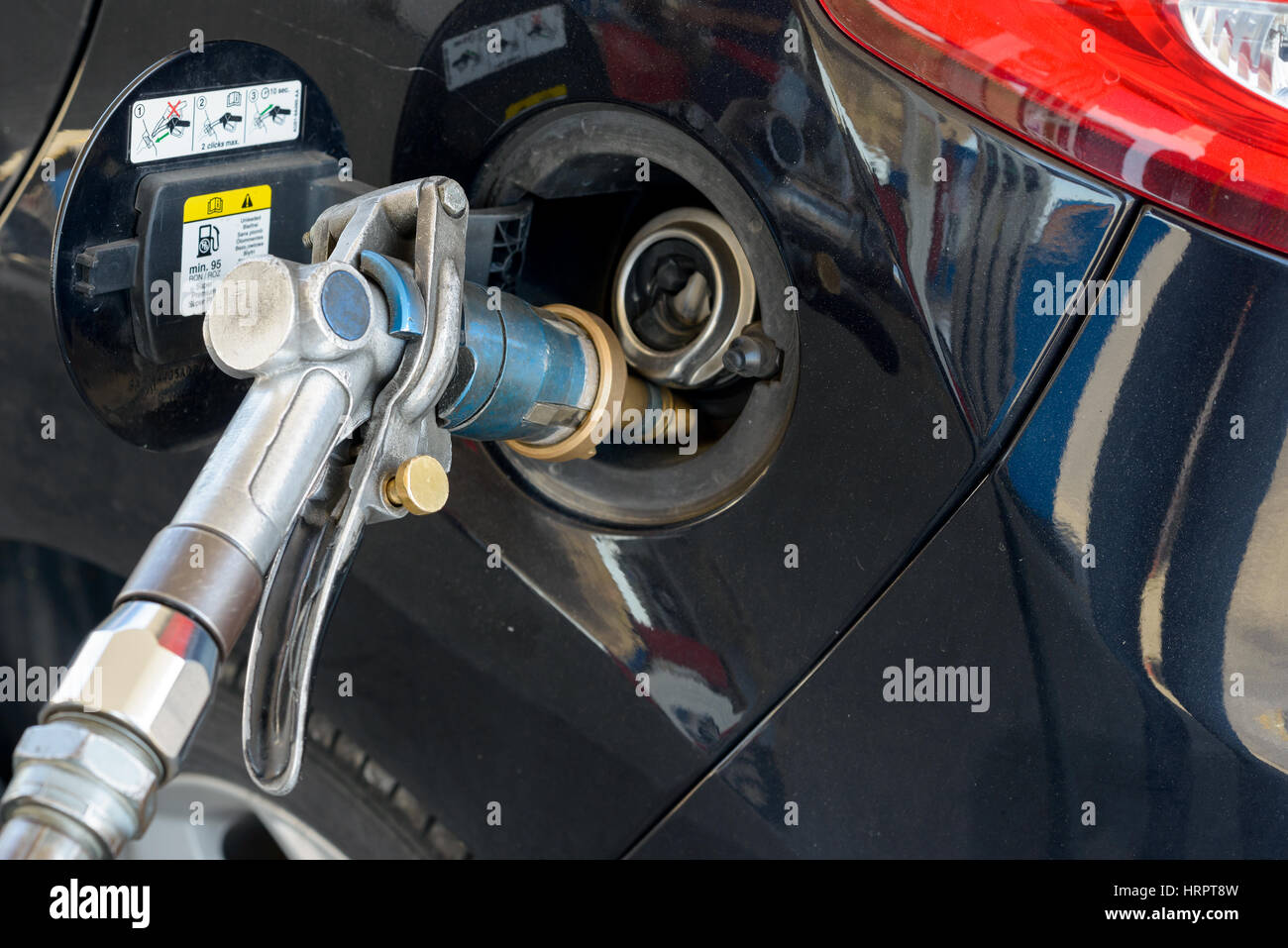 Fuel gun during liquid gas propane refill Stock Photo - Alamy
