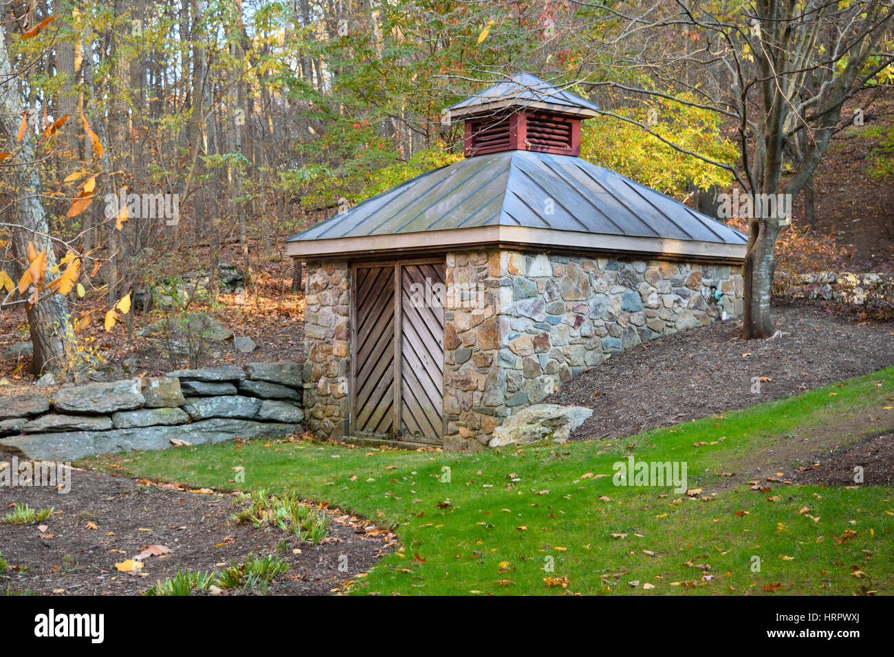 Stone Spring House in the woods Stock Photo - Alamy