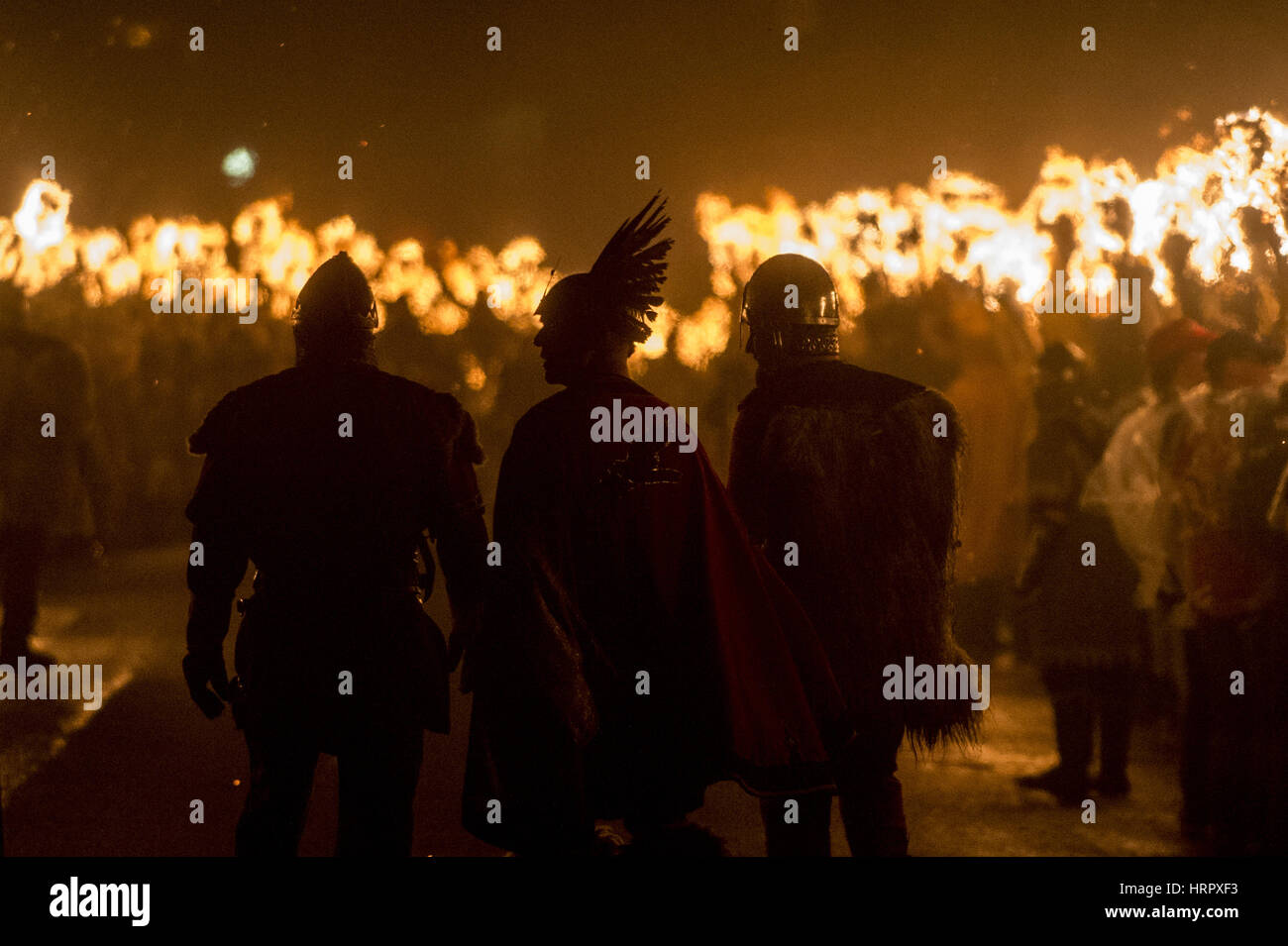 The Guizer Jarl Lyall Gair and his squad light up and march their ...