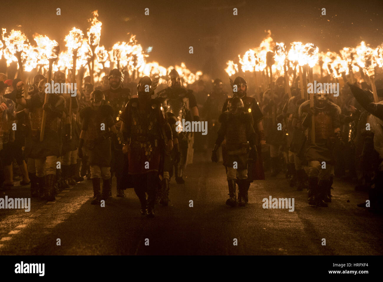 The Guizer Jarl Lyall Gair and his squad light up and march their ...