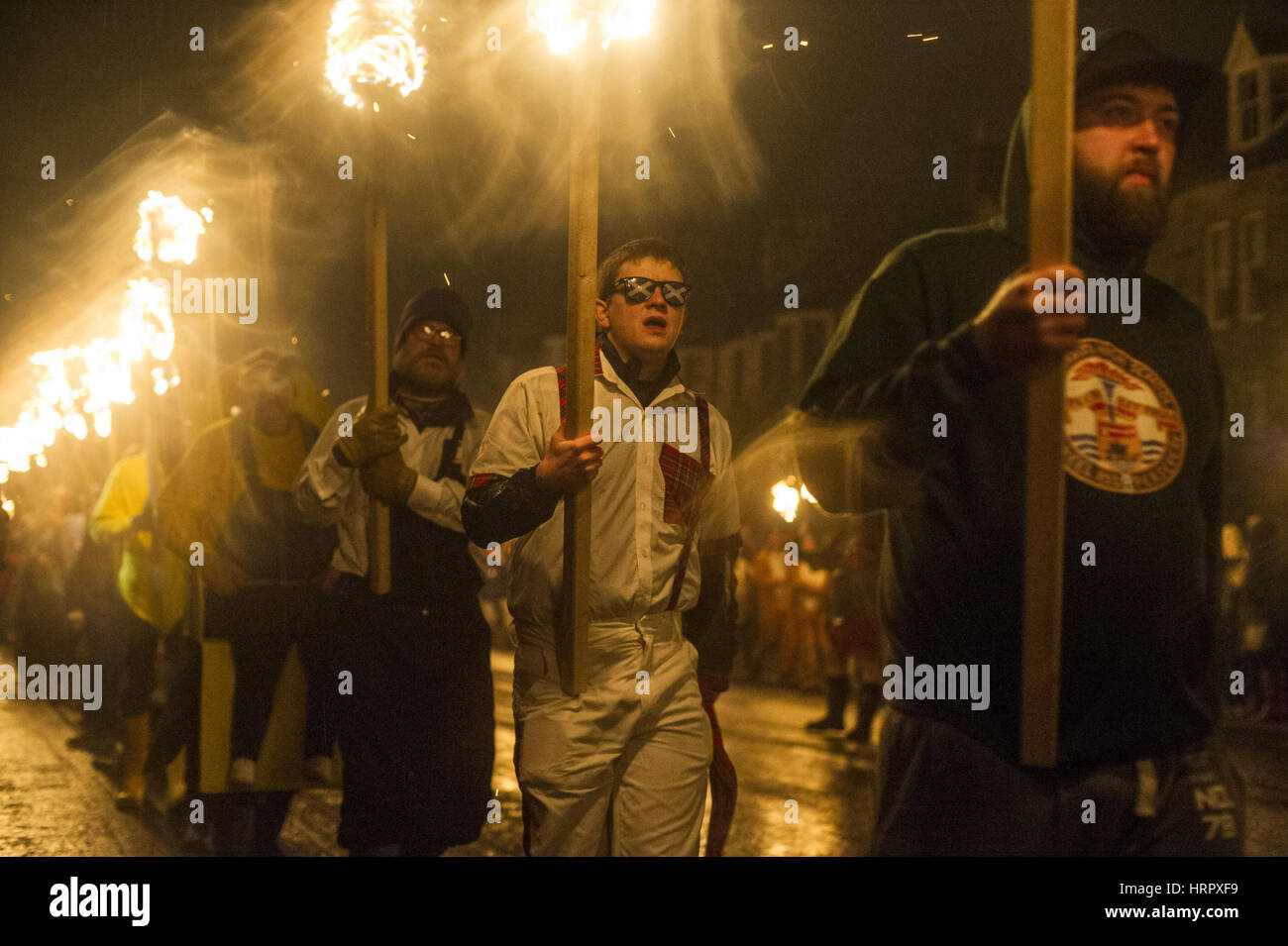 The Guizer Jarl Lyall Gair and his squad light up and march their ...