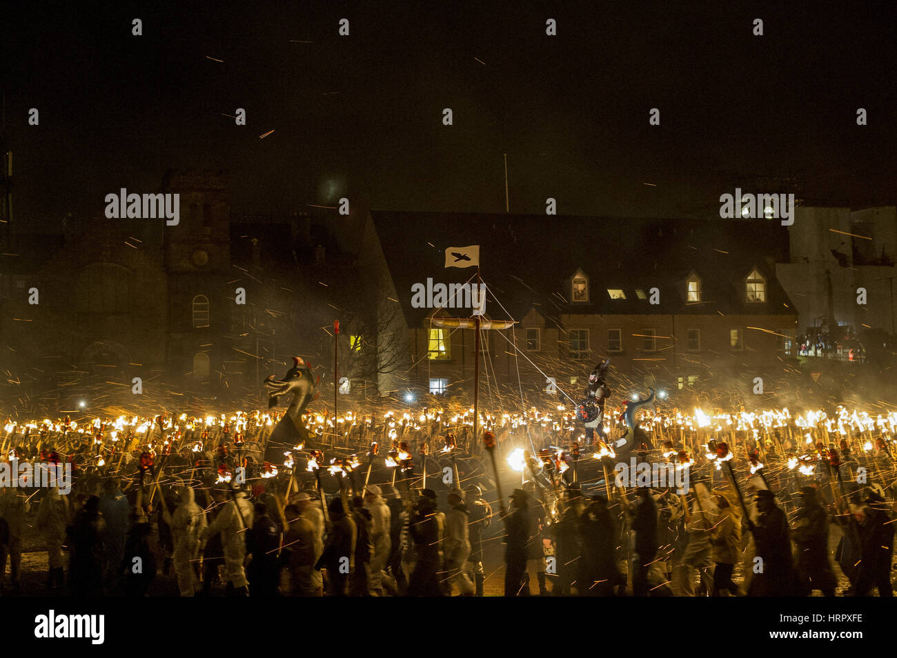 The Guizer Jarl Lyall Gair and his squad light up and march their ...