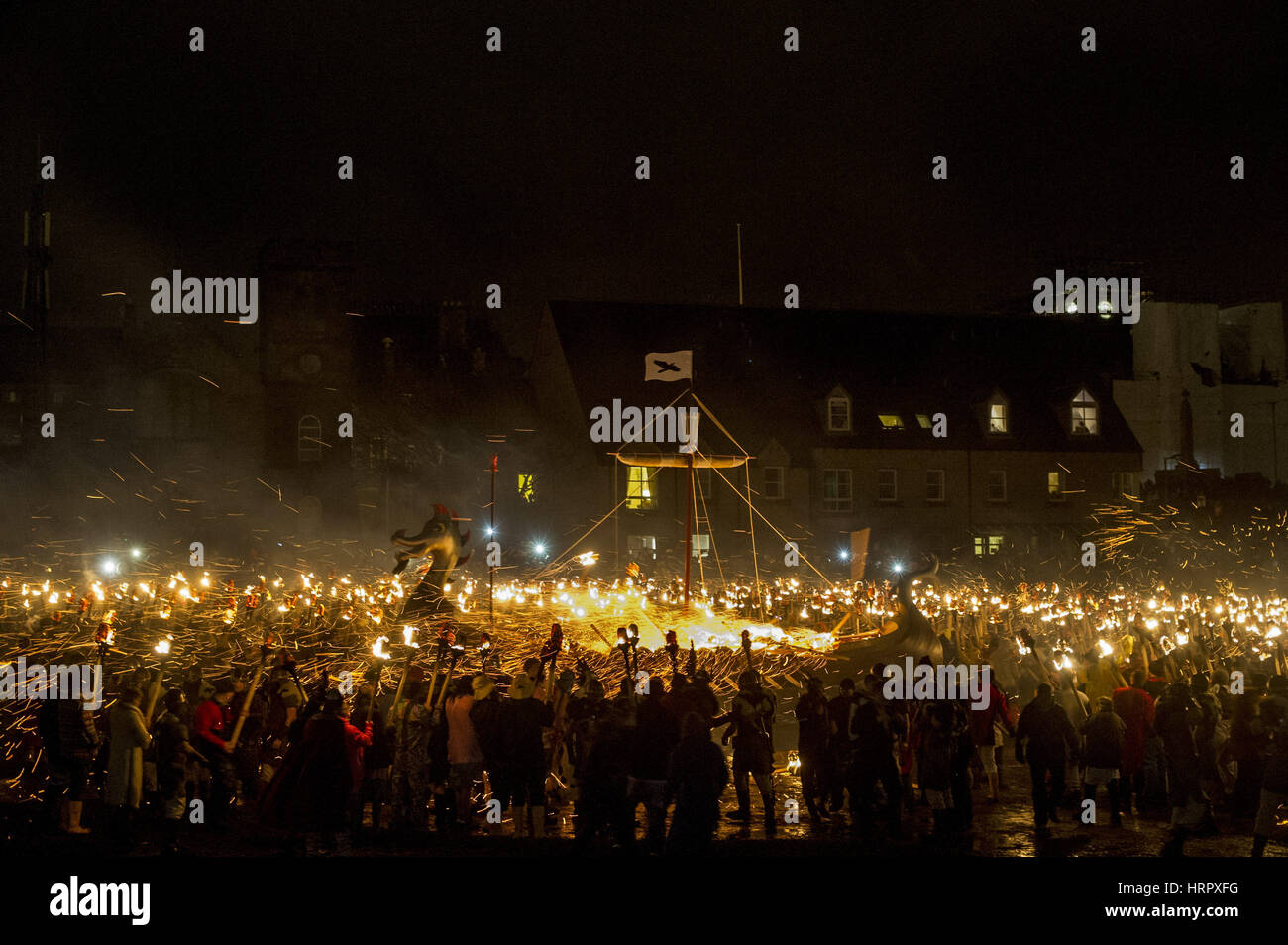 The Guizer Jarl Lyall Gair and his squad light up and march their ...