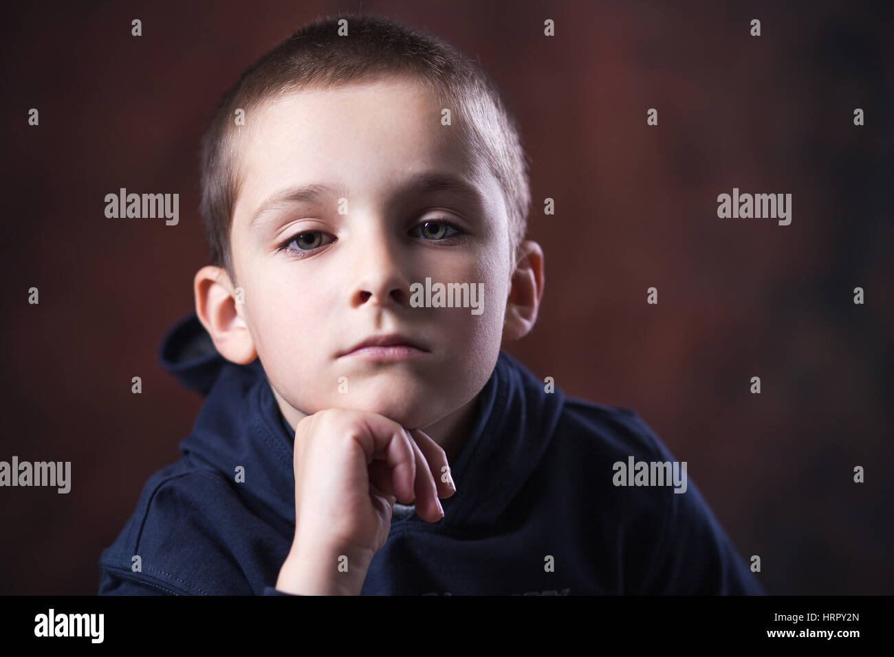 Child serious face hi-res stock photography and images - Alamy