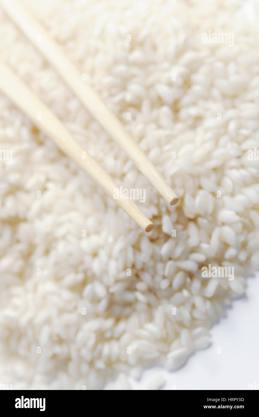 White Rice with Chopsticks Stock Photo - Alamy