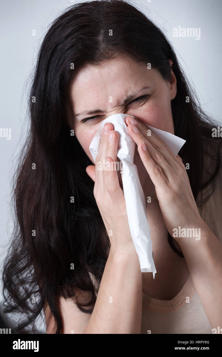 Woman tissue nose hi-res stock photography and images - Alamy